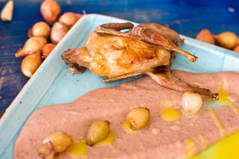 Fried Stuffed Quail with Mashed Chestnuts and Small Onions Stock Image ...