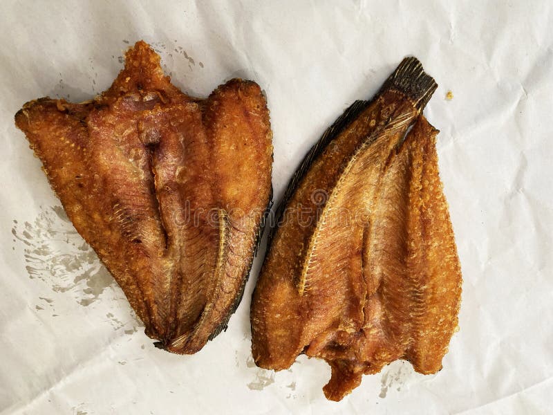 Fried Sun-dried Snakehead Fish on White Background Stock Photo - Image ...