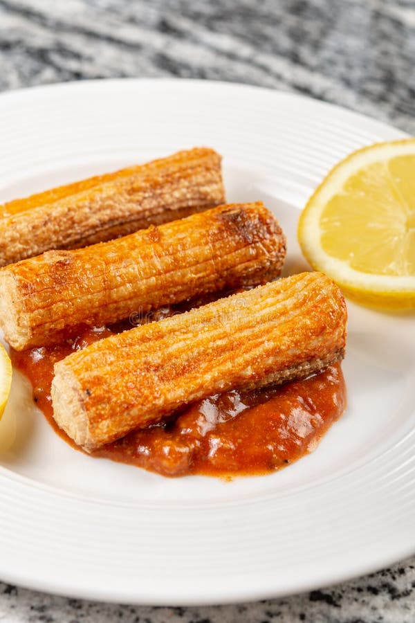 Fried Surimi Sticks with Lemons on the White Plate Stock Image - Image ...