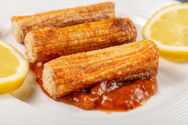 Fried Surimi Sticks with Lemons on the White Plate Stock Image - Image ...