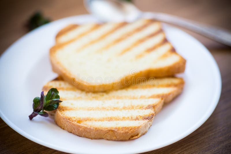 Fried Toast in a Plate on a Wooden Table Stock Photo - Image of butter ...