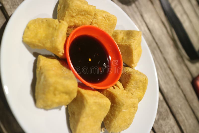 Fried Tofu And Soy Sauce On A White Plate Stock Image Image Of Green Bowl 240864469