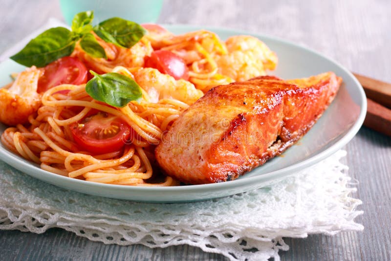 Fried Trout Fish and Spaghetti Stock Photo - Image of pasta, tomato ...
