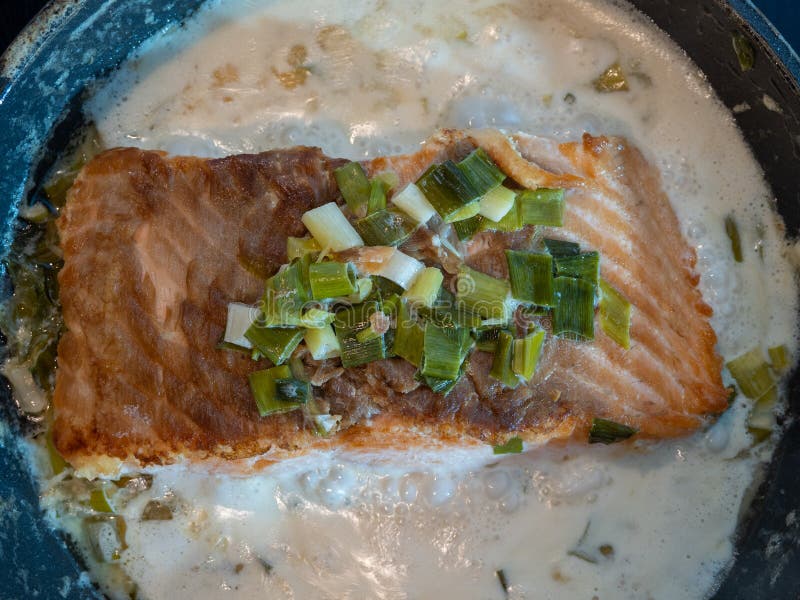 Fried Trout in a Pan. Red Fried Fish in Sauce. Stock Photo - Image of ...