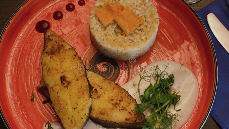Fried Trout Steaks with Rice on a Beautiful Plate Stock Footage - Video ...