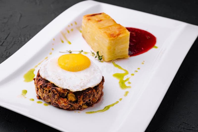 Fried Vegetable Tartare with Egg on Plate Stock Photo - Image of bread ...