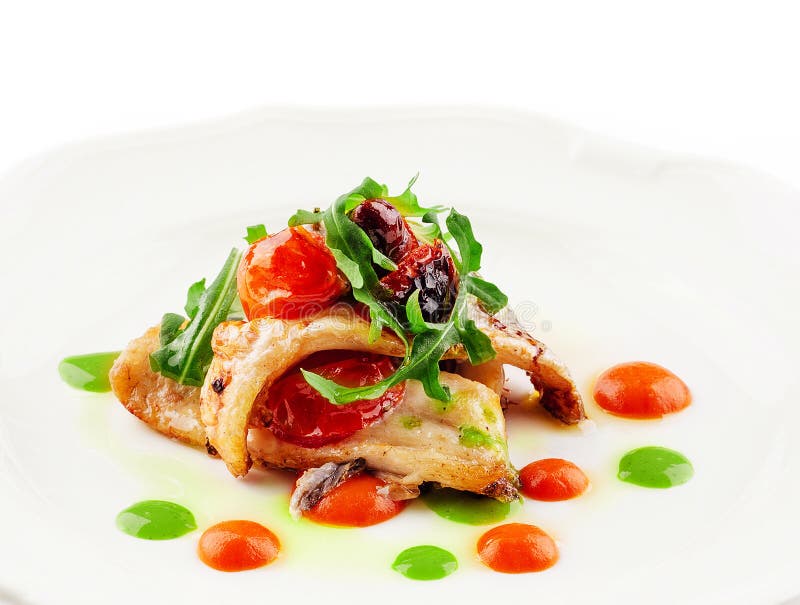 Fried White Fish Fillet with Tomatoes and Arugula Stock Photo - Image ...