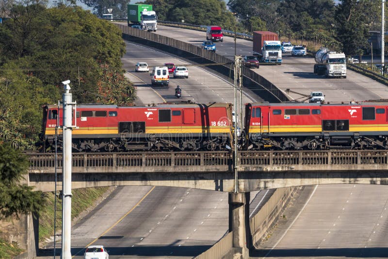 Frieght Train Passing Over Busy N3 Highway Editorial Photography ...