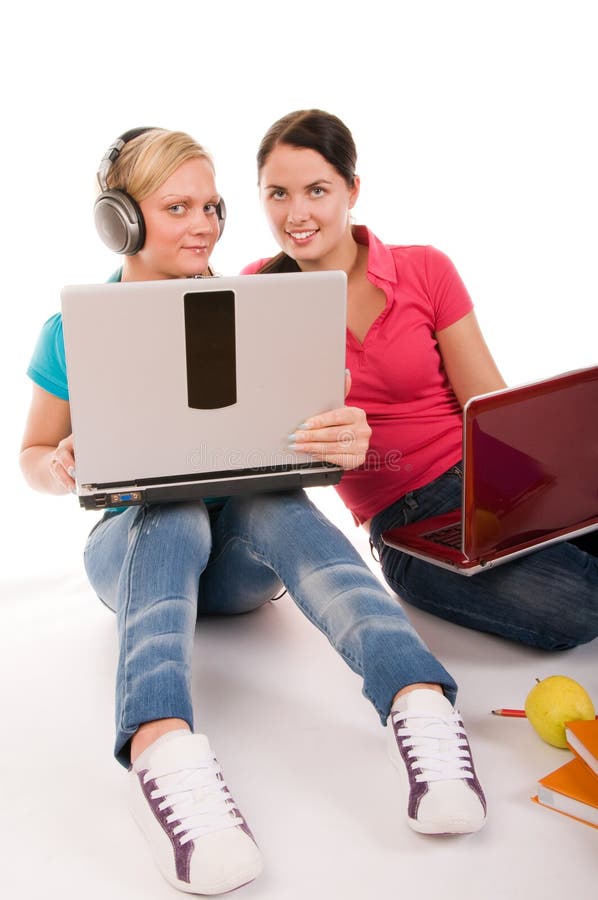 Students Relaxing with Laptops on Bed. Stock Photo - Image of home ...