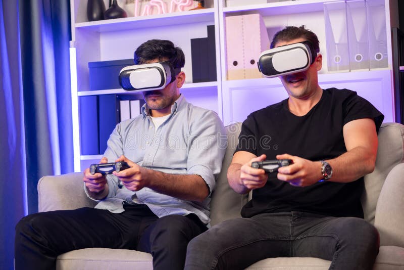 Friend Gamers Playing Video Game Using Joysticks and VR Headset ...