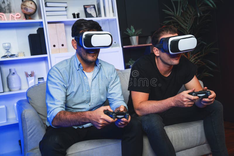 Friend Gamers Playing Video Game Using Joysticks and VR Headset ...