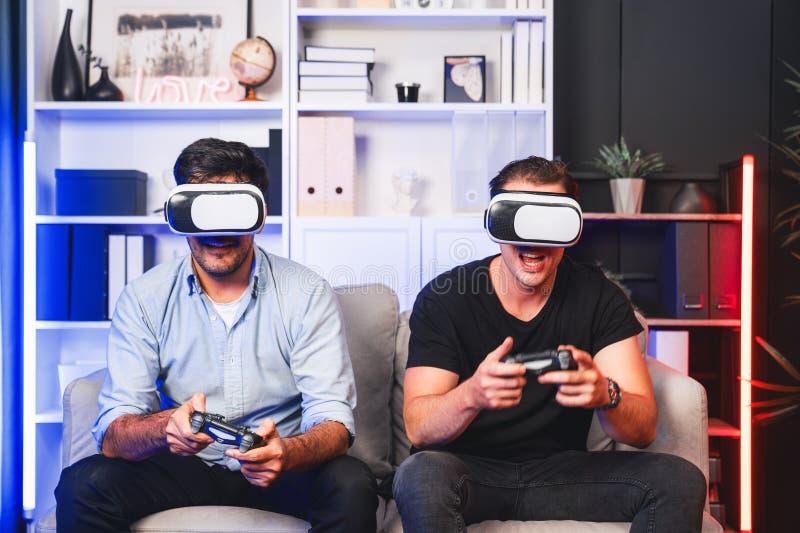Friend Gamers Playing Video Game Using Joysticks and VR Headset ...