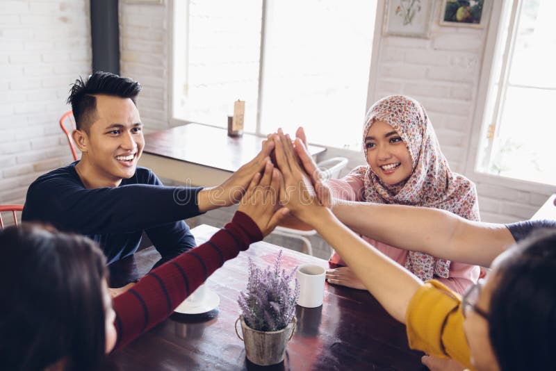 Friend Giving High Five at Cafe Stock Photo - Image of five, lunch ...