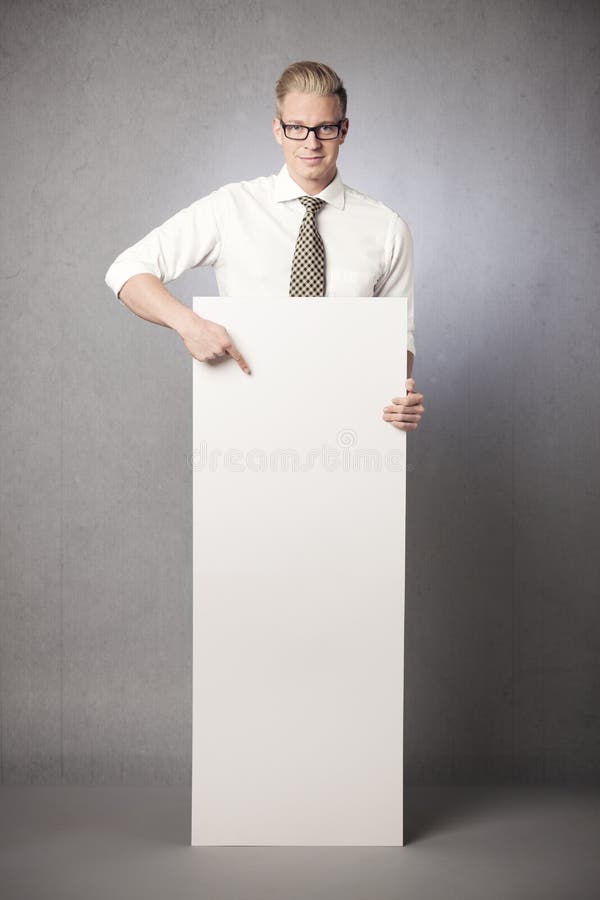 Laughing Businessman Pointing Finger at White Blank Poster. Stock Image ...
