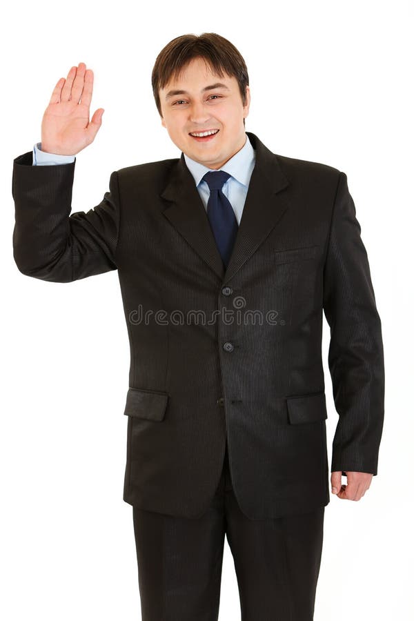Friendly Businessman Showing Salutation Gesture Stock Photo - Image of ...