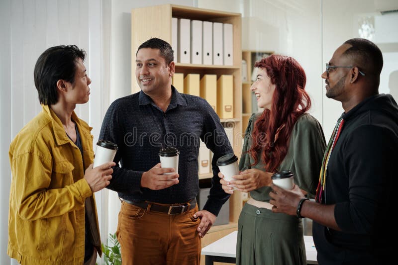 Friendly Colleagues Drinking Coffee Stock Photo - Image of office ...