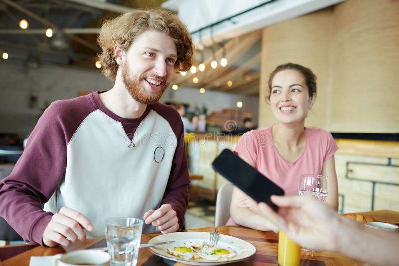 Friends talking by lunch stock image. Image of education - 100953311