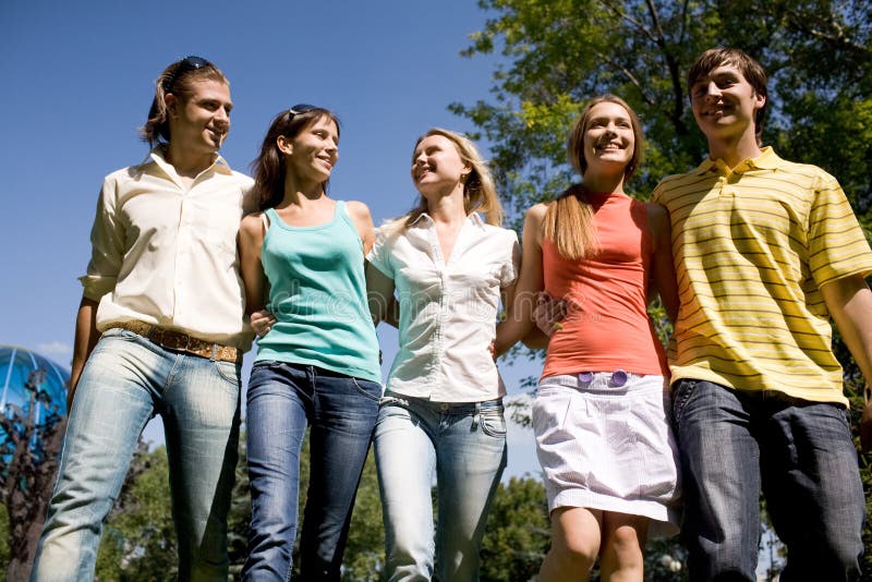 Company of readers stock photo. Image of grass, boyfriend - 10539634