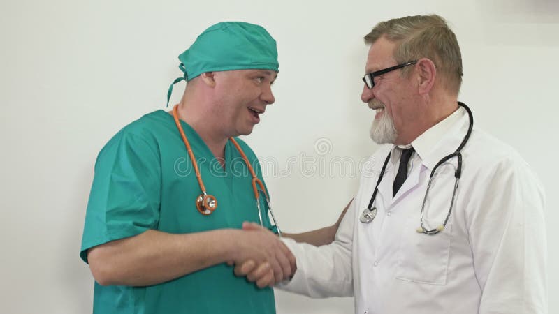 Friendly Conversation between Two Doctors. Mutual Respect and Exchange ...