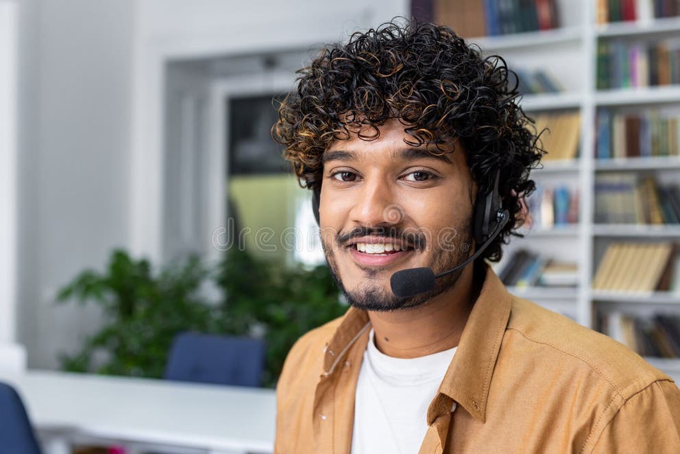 Friendly Customer Service Representative with Headset Smiling in Office ...