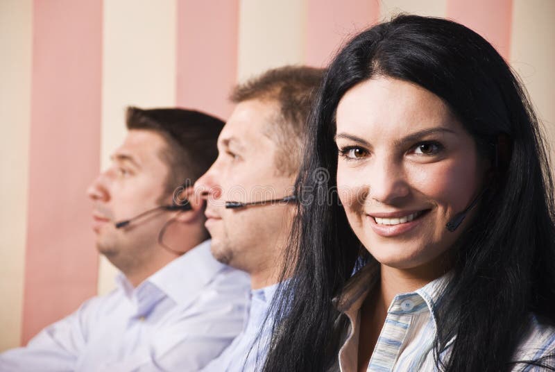 Friendly Customer Service Woman with Team Stock Image - Image of group ...