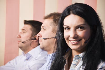 Friendly Customer Service Woman with Team Stock Image - Image of group ...