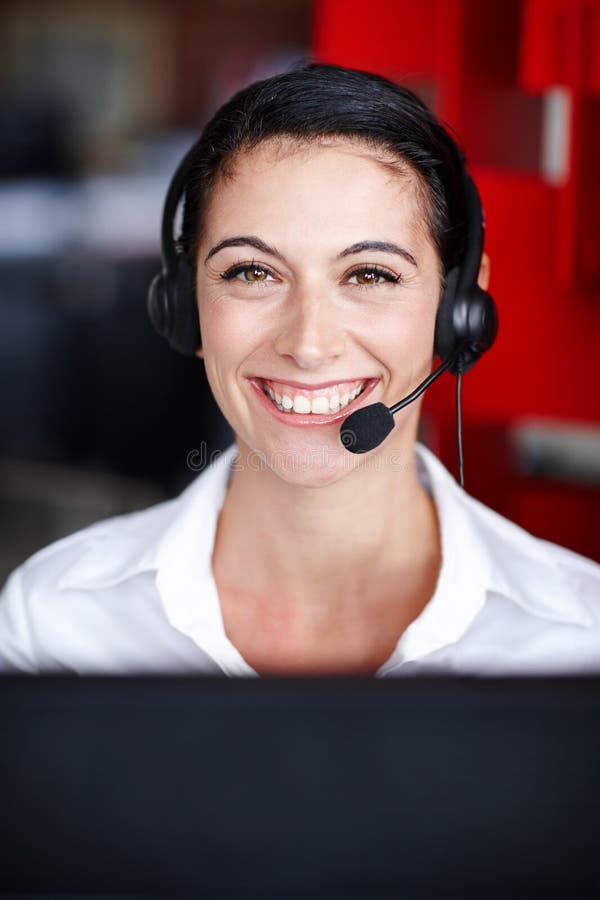Friendly and Diligent. Portrait of a Pretty Call Center Agent Wearing a ...