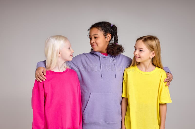 Friendly Diverse Classmates Hugging at Studio Stock Photo - Image of ...