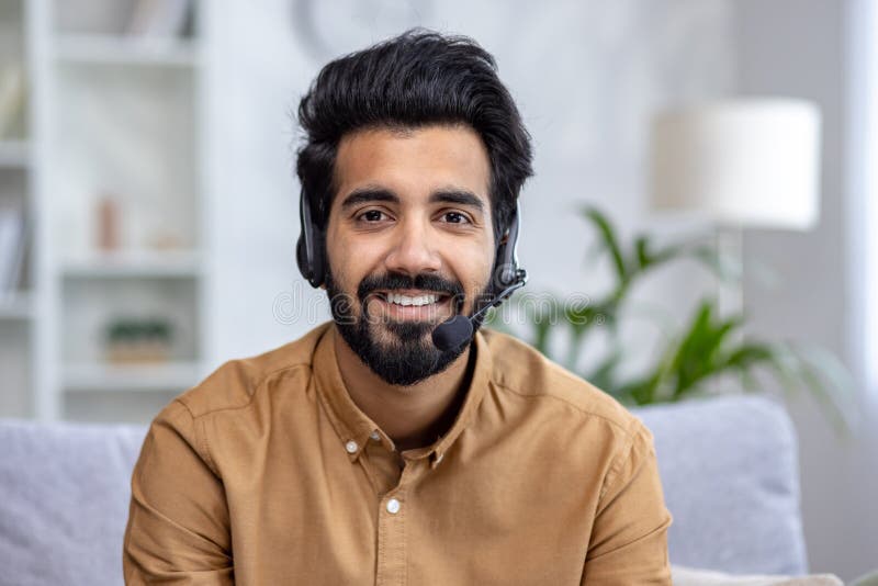 Friendly Diverse Male Wearing Wireless Headset with Micro and Looking ...