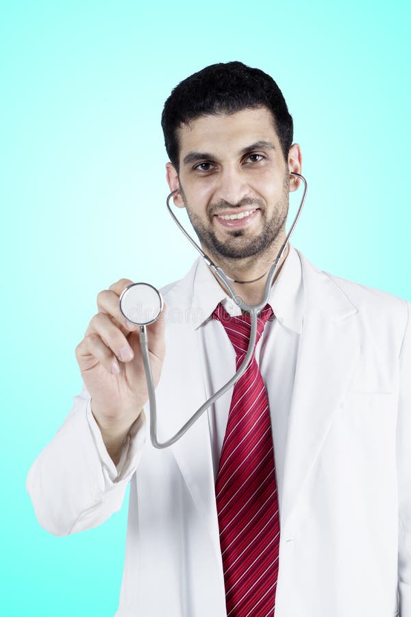Friendly Doctor Holding Stethoscope Stock Image - Image of medical ...