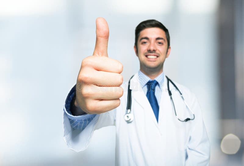 Friendly Doctor Smiling Giving Thumbs Up Stock Photo - Image of good ...