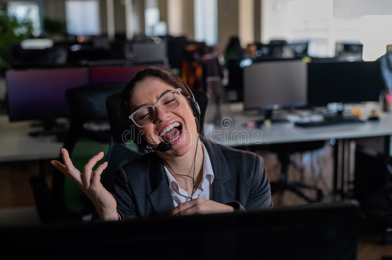Friendly Female Call Center Operator in the Open Space Office. Stock ...