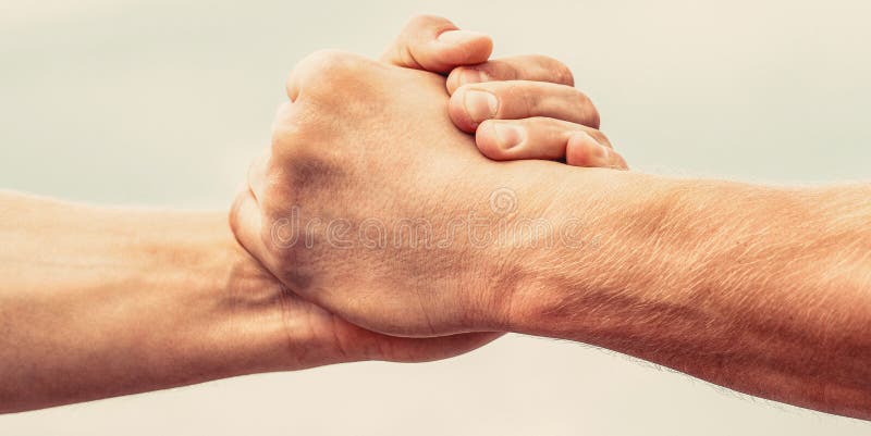 Friendly Handshake. Rescue, Helping Gesture or Hands. Strong Hold Stock ...