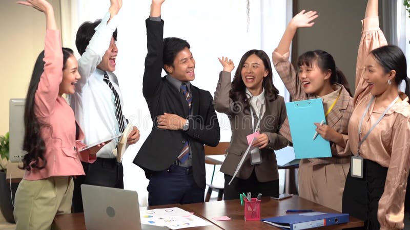 Friendly Happy Diverse Team Workers Talking Laughing Together In Office