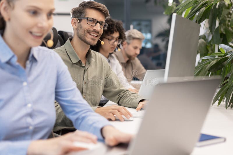 Friendly and Helpful Customer Service Support Specialists in Work Stock ...