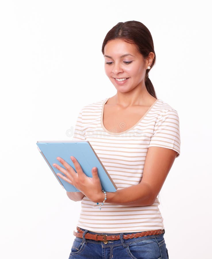 Friendly Hispanic Lady Looking at Her Tablet Pc Stock Photo - Image of ...