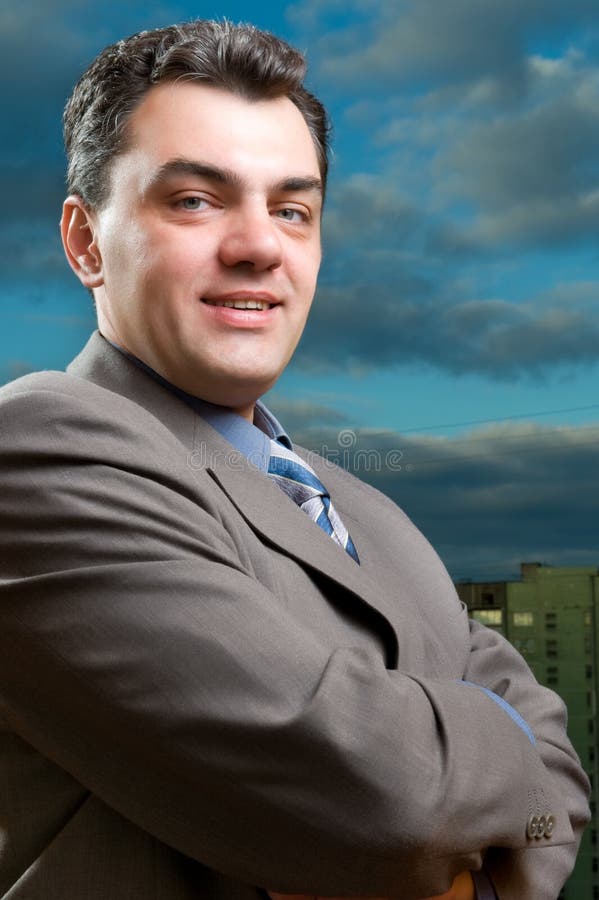 Friendly man in a suit stock photo. Image of blue, businessman - 20074216
