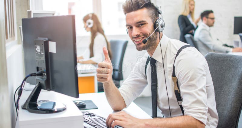Friendly Online Customer Support Agent with Headset Showing Thumb Up in ...