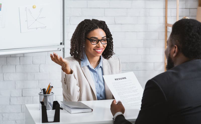 Friendly Personnel Manager Interviewing Black Candidate during Job ...