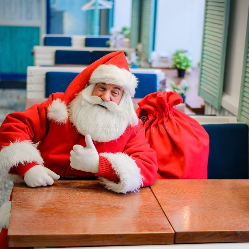 Friendly Santa Claus in a Cafe. Stock Image - Image of christmas, cafe ...