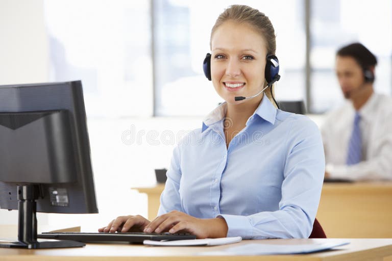 Friendly Service Agent Talking To Customer in Call Centre Stock Photo ...