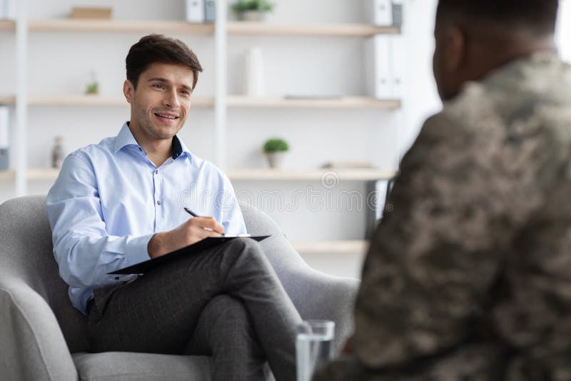 Friendly Young Man Psychologist Having Conversation with Soldier Stock ...
