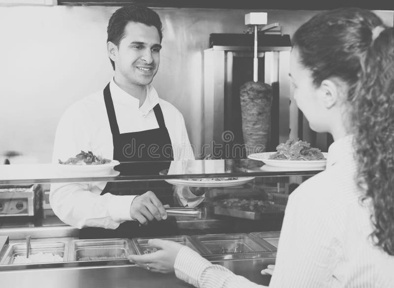 Friendly Staff and Female Client at Counter Stock Image - Image of ...