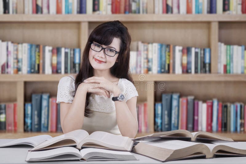 Friendly Student Smiling in the Library Stock Image - Image of class ...
