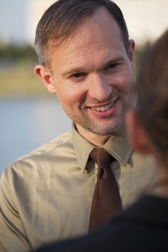 Friendly Talk on the Street Stock Image - Image of teamwork, adults ...