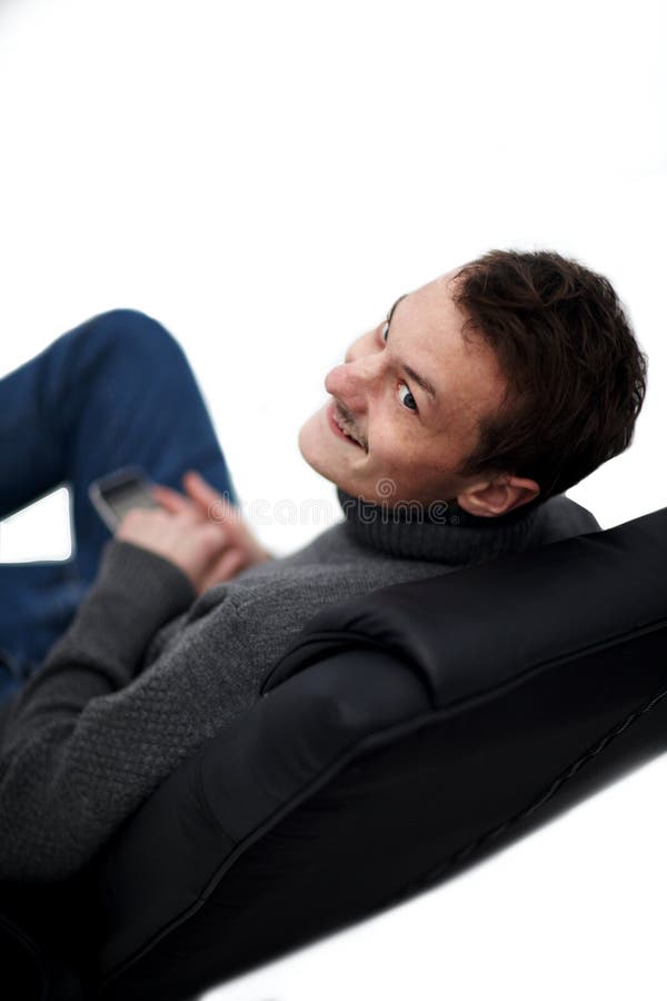 Friendly Young Guy in Chair Looking at You Stock Image - Image of adult ...