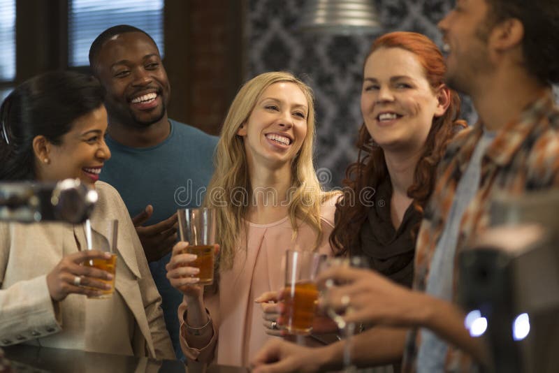 Friends at a bar stock image. Image of females, indoors - 66128013