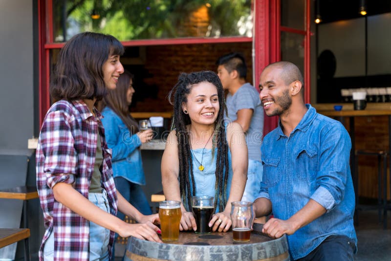 Friends in a Bar Having Fun Stock Photo - Image of friendship, drinking ...