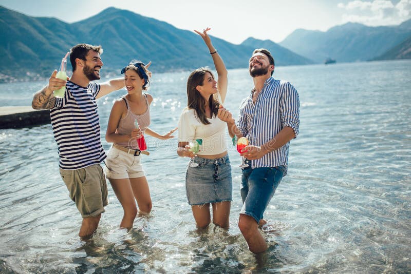 Friends at the Beach Drinking Cocktails Having Fun Stock Image - Image ...