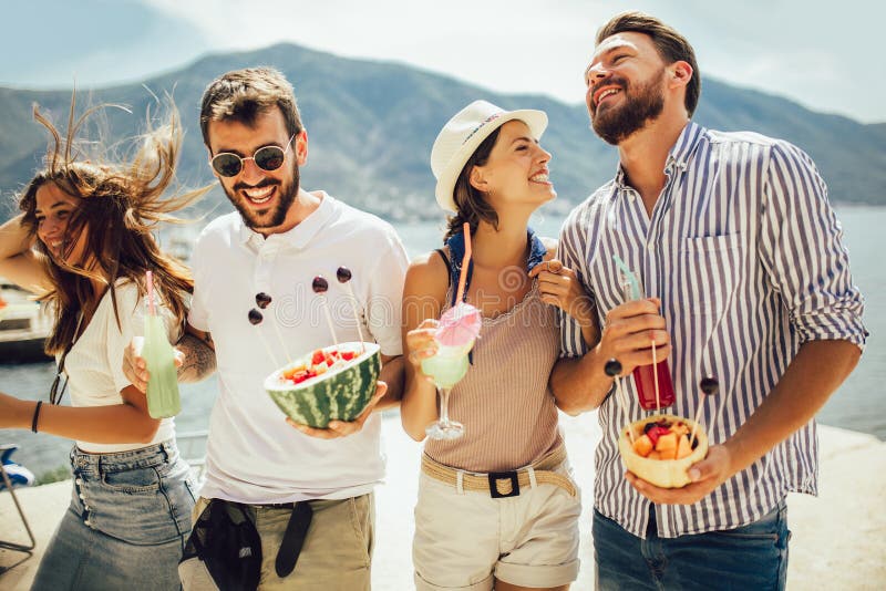 Friends at the Beach Drinking Cocktails Having Fun on Summer Vacation ...